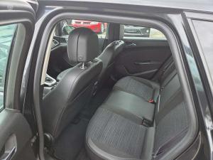 Black Opel Astra 2014 in Marijampole, with an engine capacity of 1.36 L and mileage of 187 thousand km for 3900 €, photo 12 on AUTOMOTO.COM.LV