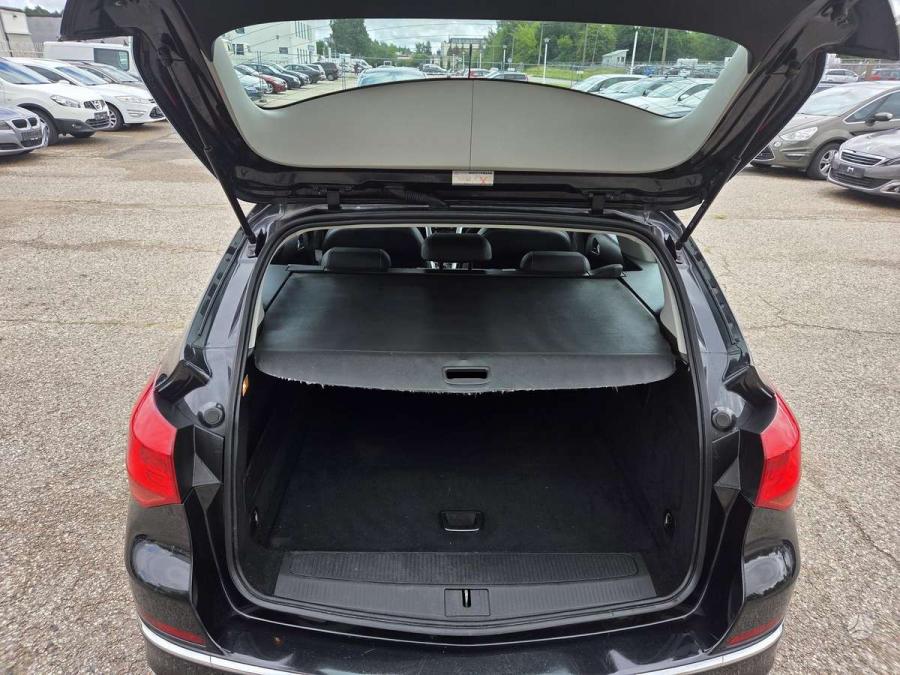 Black Opel Astra 2014 in Marijampole, with an engine capacity of 1.36 L and mileage of 187 thousand km for 3900 €, photo 13 on AUTOMOTO.COM.LV
