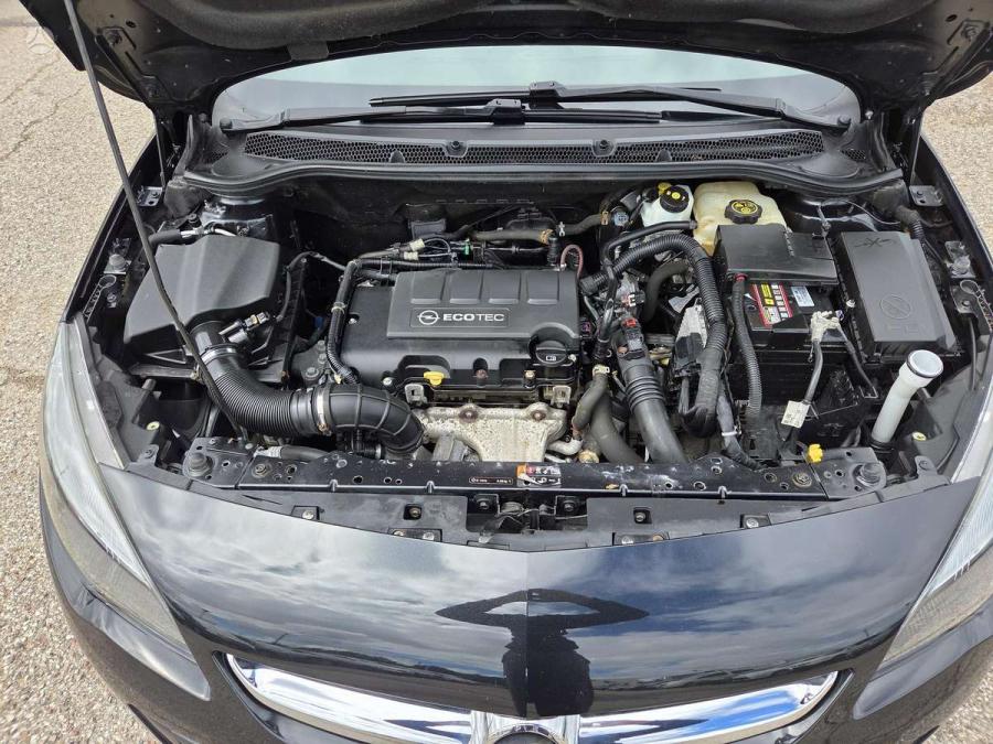 Black Opel Astra 2014 in Marijampole, with an engine capacity of 1.36 L and mileage of 187 thousand km for 3900 €, photo 21 on AUTOMOTO.COM.LV
