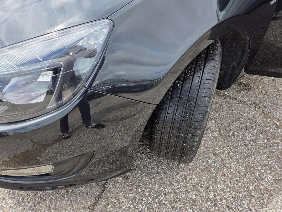 Black Opel Astra 2014 in Marijampole, with an engine capacity of 1.36 L and mileage of 187 thousand km for 3900 €, photo 22 on AUTOMOTO.COM.LV
