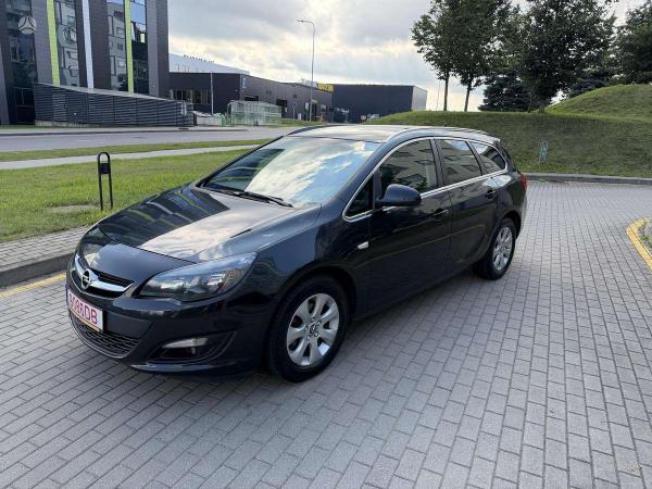 Black Opel Astra 2014 in Vilnius, with an engine capacity of 1.60 L and mileage of 266 thousand km for 3000 €, photo 1 on AUTOMOTO.COM.LV