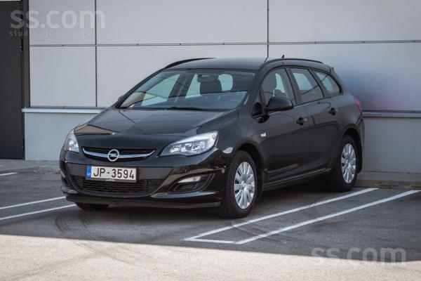 Black Opel Astra 2014 in Riga, with an engine capacity of 1.40 L and mileage of 218 thousand km for 3990 €, photo 1 on AUTOMOTO.COM.LV
