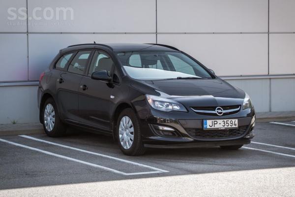Black Opel Astra 2014 in Riga, with an engine capacity of 1.40 L and mileage of 218 thousand km for 3990 €, photo 3 on AUTOMOTO.COM.LV