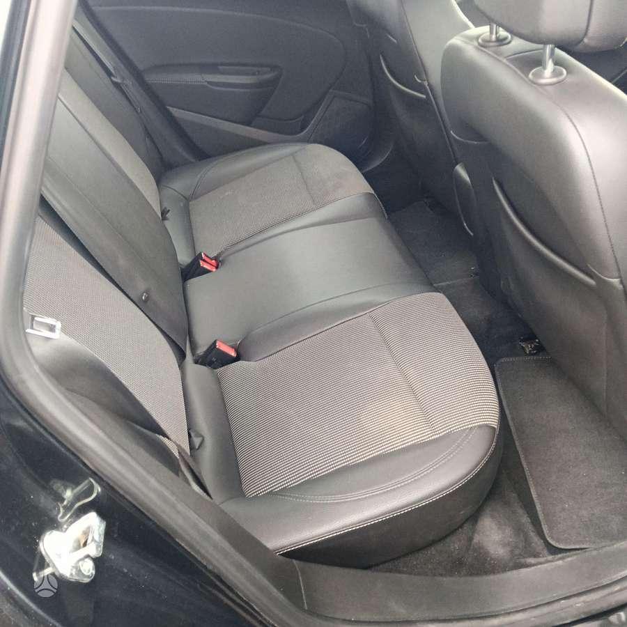 Black Opel Astra 2014 in Kaunas, with an engine capacity of 1.60 L and mileage of 220 thousand km for 3950 €, photo 7 on AUTOMOTO.COM.LV
