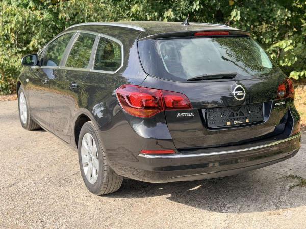 Melns Opel Astra 2014 Šauļi, ar dzinēja tilpumu 1.69 L un nobraukumu 280 tūkst. km par 3850 €, foto 8 vietnē AUTOMOTO.COM.LV