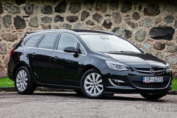 Black Opel Astra 2014 in Tukums, with an engine capacity of 1.60 L and mileage of 216 thousand km for 5695 €, photo 1 on AUTOMOTO.COM.LV