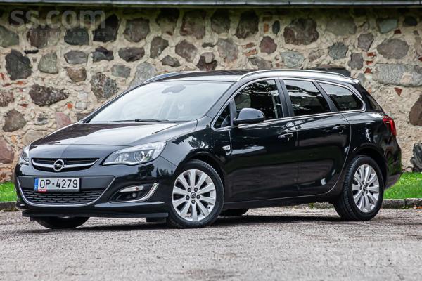 Black Opel Astra 2014 in Tukums, with an engine capacity of 1.60 L and mileage of 216 thousand km for 5695 €, photo 3 on AUTOMOTO.COM.LV