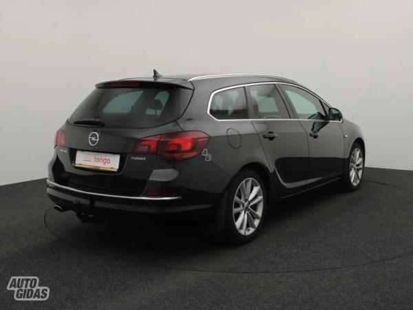 Black Opel Astra 2015 in Vilnius, with an engine capacity of 1.40 L and mileage of 218 thousand km for 5899 €, photo 8 on AUTOMOTO.COM.LV
