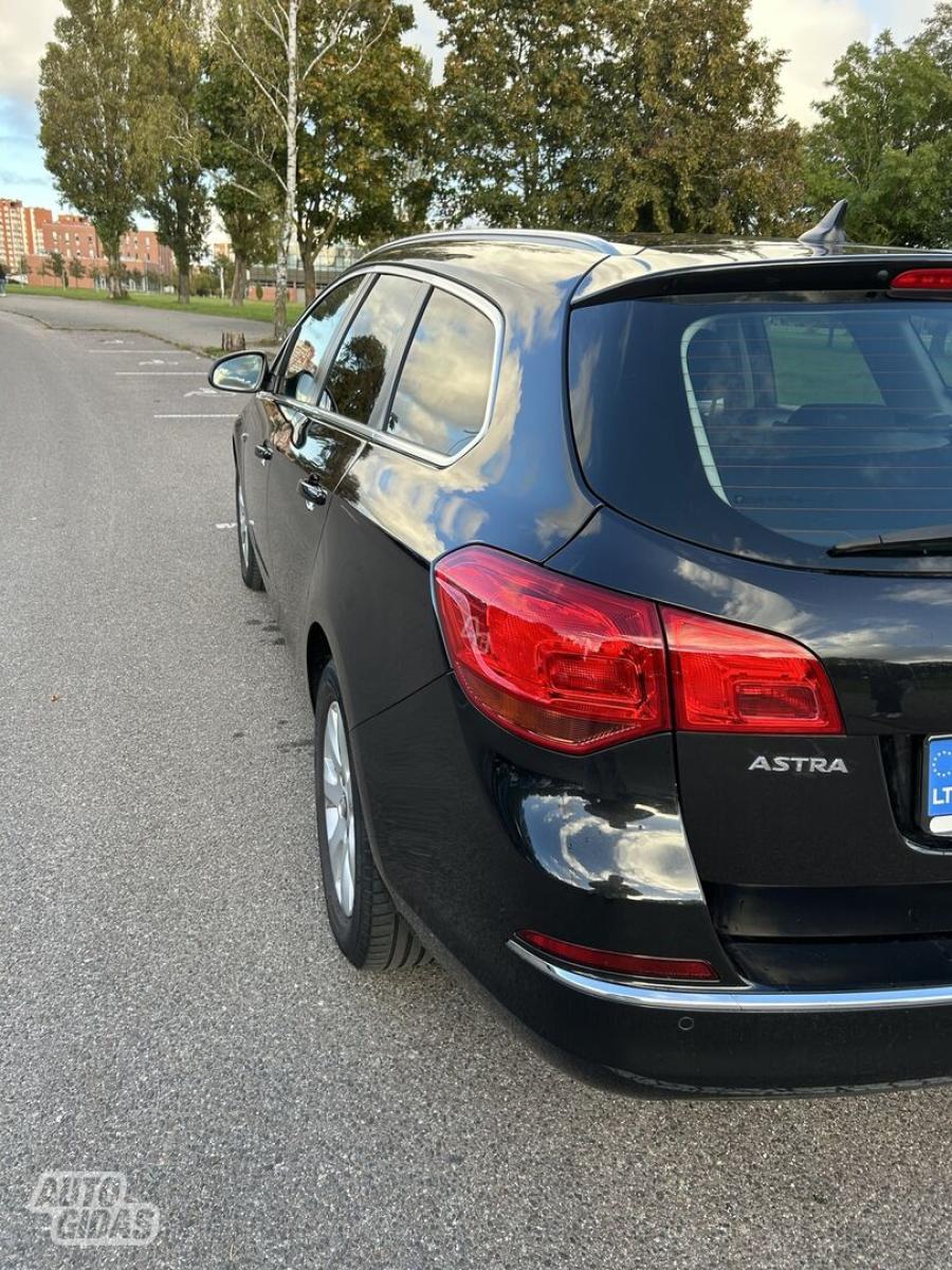 Black Opel Astra 2015 in Klaipeda, with an engine capacity of 1.60 L and mileage of 208 thousand km for 5000 €, photo 6 on AUTOMOTO.COM.LV
