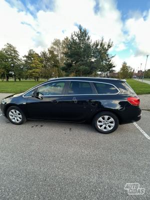 Black Opel Astra 2015 in Klaipeda, with an engine capacity of 1.60 L and mileage of 208 thousand km for 5000 €, photo 7 on AUTOMOTO.COM.LV