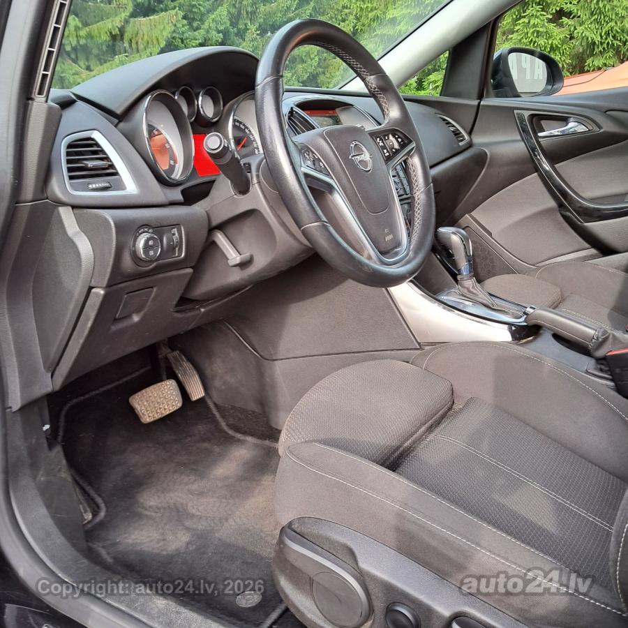 Melns Opel Astra 2015 Tallina, ar dzinēja tilpumu 2.00 L un nobraukumu 395 tūkst. km par 3500 €, foto 8 vietnē AUTOMOTO.COM.LV