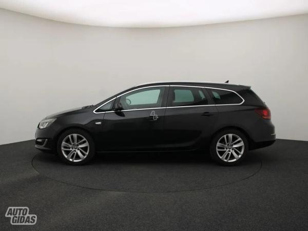 Black Opel Astra 2015 in Vilnius, with an engine capacity of 1.60 L and mileage of 184 thousand km for 6199 €, photo 6 on AUTOMOTO.COM.LV