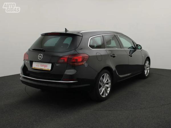 Black Opel Astra 2015 in Vilnius, with an engine capacity of 1.60 L and mileage of 184 thousand km for 6199 €, photo 8 on AUTOMOTO.COM.LV