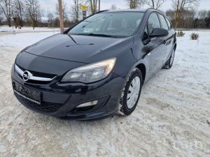 Black Opel Astra 2015 in Ogre, with an engine capacity of 2.00 L and mileage of 202 thousand km for 5750 €, photo  on AUTOMOTO.COM.LV