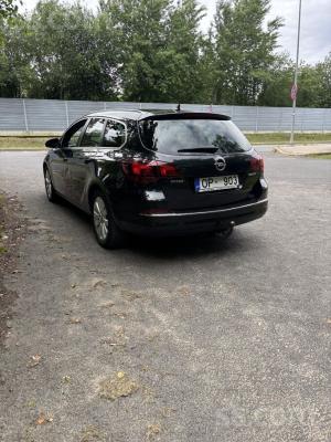 Black Opel Astra 2015 in Riga, with an engine capacity of 1.60 L and mileage of 192 thousand km for 4400 €, photo 9 on AUTOMOTO.COM.LV
