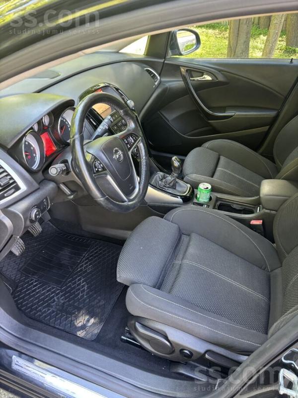 Melns Opel Astra 2015 Rīga, ar dzinēja tilpumu 1.60 L un nobraukumu 192 tūkst. km par 4400 €, foto 9 vietnē AUTOMOTO.COM.LV