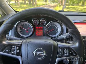 Black Opel Astra 2015 in Riga, with an engine capacity of 1.60 L and mileage of 192 thousand km for 4400 €, photo 11 on AUTOMOTO.COM.LV
