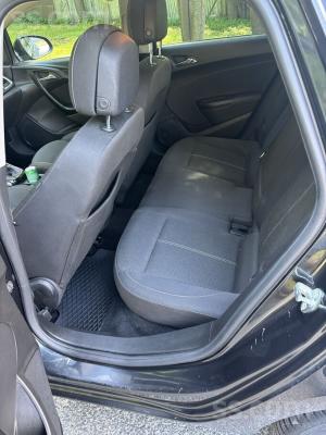 Black Opel Astra 2015 in Riga, with an engine capacity of 1.60 L and mileage of 192 thousand km for 4400 €, photo 12 on AUTOMOTO.COM.LV
