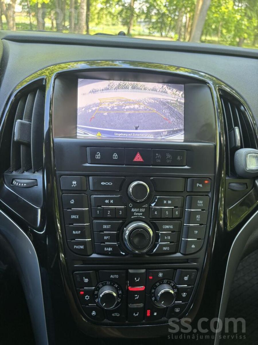 Black Opel Astra 2015 in Riga, with an engine capacity of 1.60 L and mileage of 192 thousand km for 4400 €, photo 13 on AUTOMOTO.COM.LV