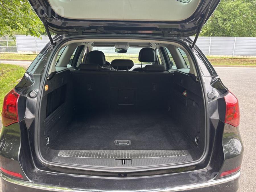 Black Opel Astra 2015 in Riga, with an engine capacity of 1.60 L and mileage of 192 thousand km for 4400 €, photo 15 on AUTOMOTO.COM.LV