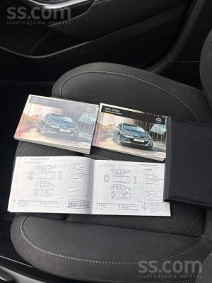Black Opel Astra 2015 in Riga, with an engine capacity of 1.60 L and mileage of 192 thousand km for 4400 €, photo 16 on AUTOMOTO.COM.LV
