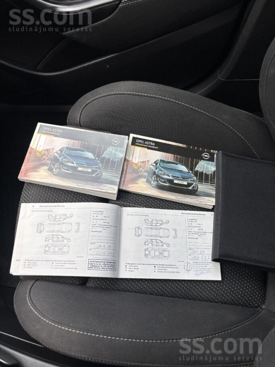 Black Opel Astra 2015 in Riga, with an engine capacity of 1.60 L and mileage of 192 thousand km for 4400 €, photo 16 on AUTOMOTO.COM.LV