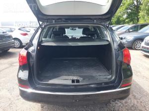 Black Opel Astra 2015 in Cesis, with an engine capacity of 1.60 L and mileage of 189 thousand km for 5600 €, photo 14 on AUTOMOTO.COM.LV