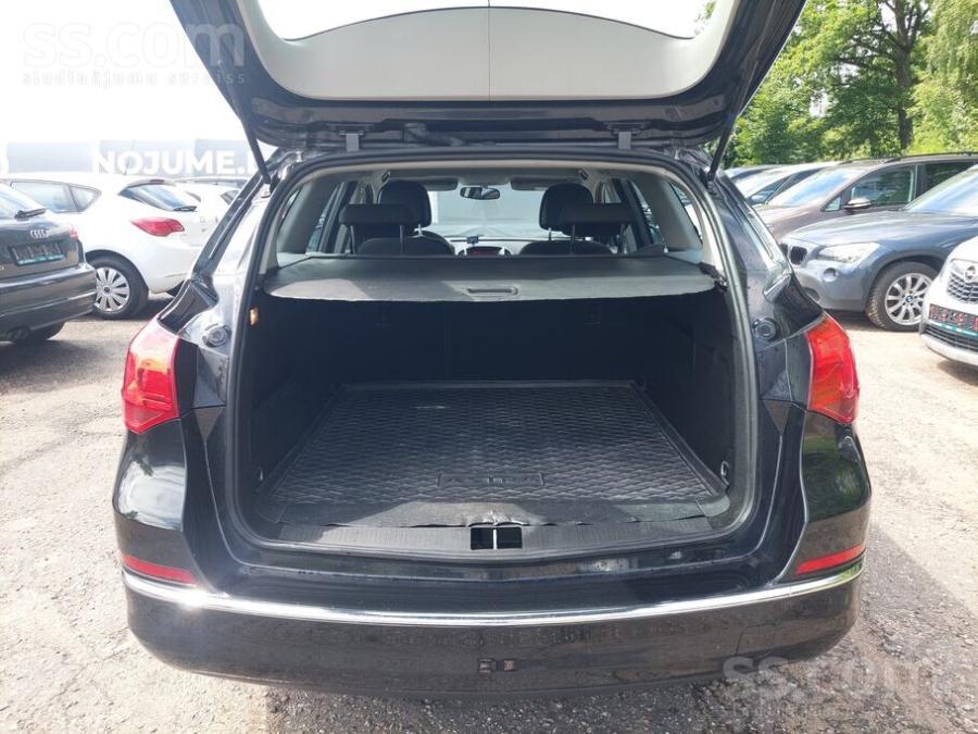 Black Opel Astra 2015 in Cesis, with an engine capacity of 1.60 L and mileage of 189 thousand km for 5600 €, photo 14 on AUTOMOTO.COM.LV