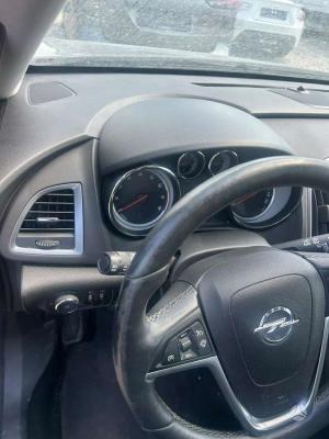 Black Opel Astra 2015 in Marijampole, with an engine capacity of 1.60 L and mileage of 170 thousand km for 2800 €, photo 9 on AUTOMOTO.COM.LV