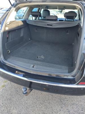 Black Opel Astra 2015 in Panevezys, with an engine capacity of 1.60 L and mileage of 238 thousand km for 3650 €, photo 6 on AUTOMOTO.COM.LV