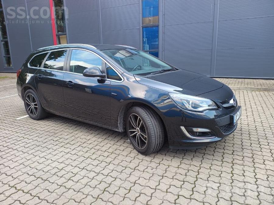 Black Opel Astra 2015 in Riga, with an engine capacity of 2.00 L and mileage of 229 thousand km for 7000 €, photo 3 on AUTOMOTO.COM.LV