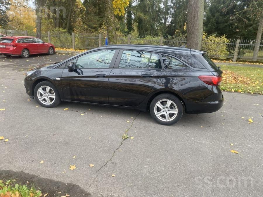 Black Opel Astra 2016 in Riga, with an engine capacity of 1.60 L and mileage of 0 thousand km for 5200 €, photo 2 on AUTOMOTO.COM.LV