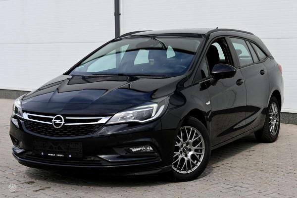 Black Opel Astra 2016 in Kretinga, with an engine capacity of 1.60 L and mileage of 174 thousand km for 5999 €, photo 3 on AUTOMOTO.COM.LV