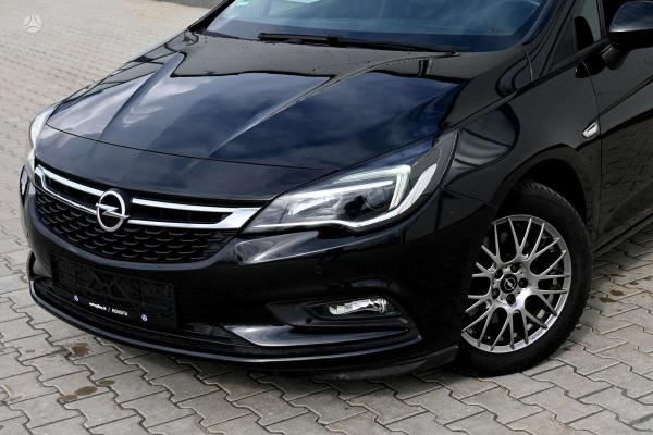 Black Opel Astra 2016 in Kretinga, with an engine capacity of 1.60 L and mileage of 174 thousand km for 5999 €, photo 4 on AUTOMOTO.COM.LV