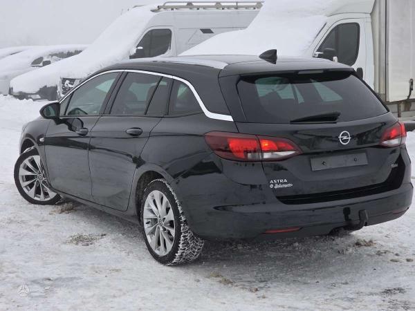 Black Opel Astra 2016 in Taurage, with an engine capacity of 1.60 L and mileage of 262 thousand km for 6150 €, photo 6 on AUTOMOTO.COM.LV