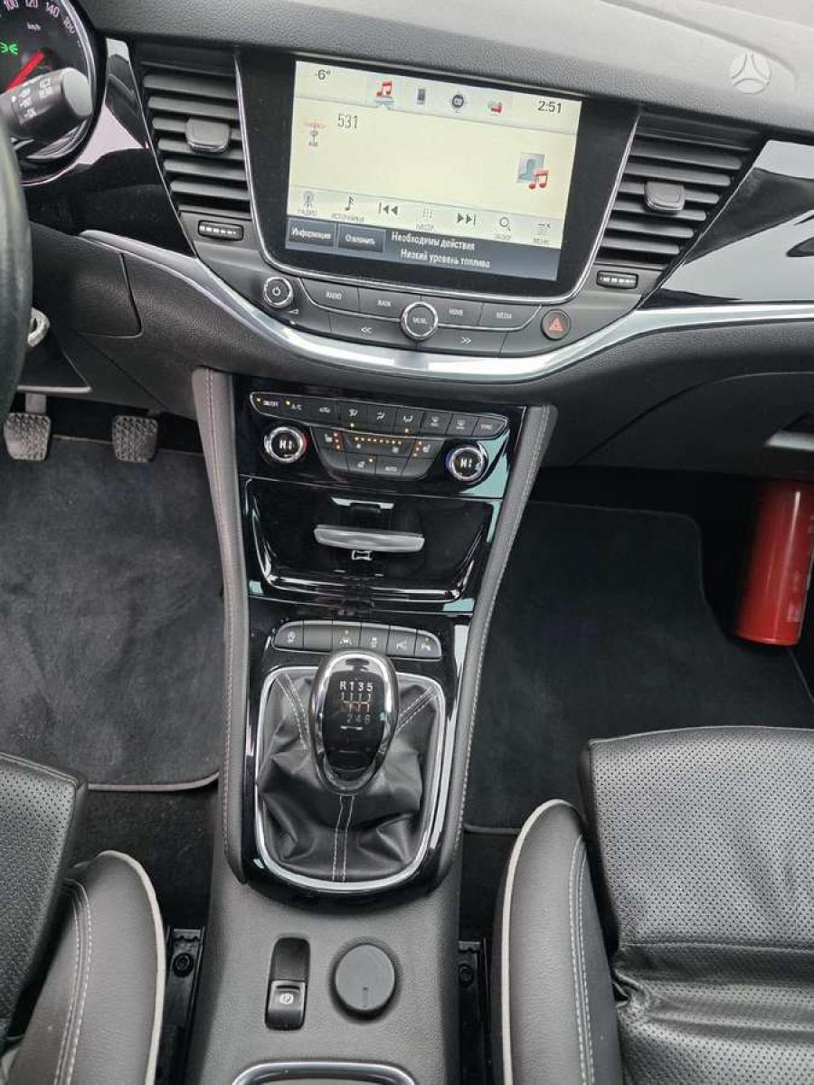 Black Opel Astra 2016 in Taurage, with an engine capacity of 1.60 L and mileage of 262 thousand km for 6150 €, photo 10 on AUTOMOTO.COM.LV