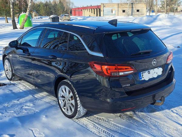 Black Opel Astra 2016 in Taurage, with an engine capacity of 1.60 L and mileage of 250 thousand km for 6200 €, photo 6 on AUTOMOTO.COM.LV