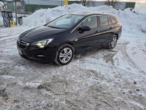Black Opel Astra 2016 in Siauliai, with an engine capacity of 1.60 L and mileage of 227 thousand km for 5900 €, photo 8 on AUTOMOTO.COM.LV