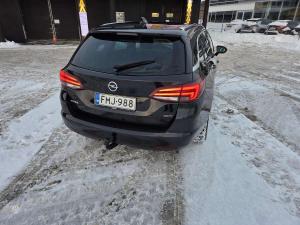 Black Opel Astra 2016 in Siauliai, with an engine capacity of 1.60 L and mileage of 227 thousand km for 5900 €, photo 12 on AUTOMOTO.COM.LV