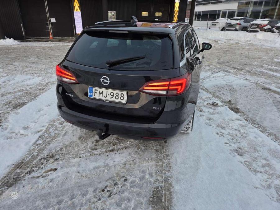 Black Opel Astra 2016 in Siauliai, with an engine capacity of 1.60 L and mileage of 227 thousand km for 5900 €, photo 12 on AUTOMOTO.COM.LV