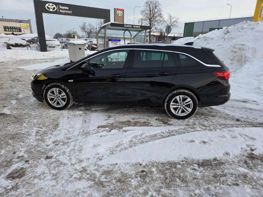Black Opel Astra 2016 in Siauliai, with an engine capacity of 1.60 L and mileage of 227 thousand km for 5900 €, photo 15 on AUTOMOTO.COM.LV