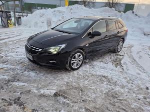 Black Opel Astra 2016 in Siauliai, with an engine capacity of 1.60 L and mileage of 227 thousand km for 5900 €, photo 17 on AUTOMOTO.COM.LV