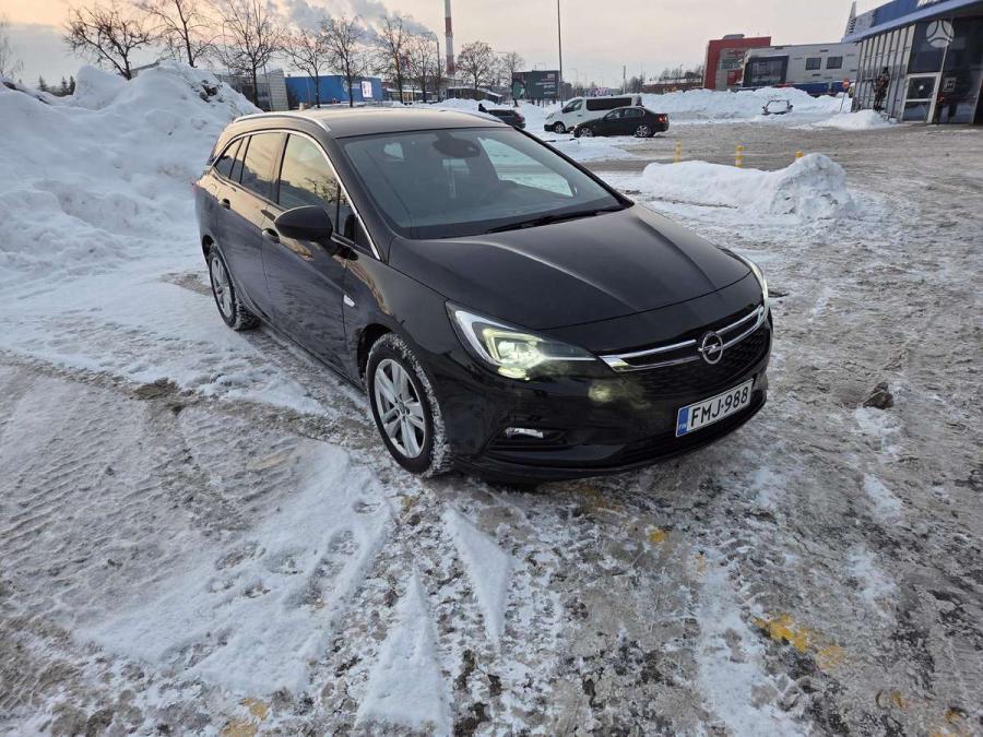 Black Opel Astra 2016 in Siauliai, with an engine capacity of 1.60 L and mileage of 227 thousand km for 5900 €, photo 18 on AUTOMOTO.COM.LV