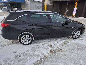Black Opel Astra 2016 in Siauliai, with an engine capacity of 1.60 L and mileage of 227 thousand km for 5900 €, photo 20 on AUTOMOTO.COM.LV