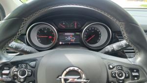 Black Opel Astra 2016 in Alytus, with an engine capacity of 1.00 L and mileage of 261 thousand km for 4999 €, photo 12 on AUTOMOTO.COM.LV
