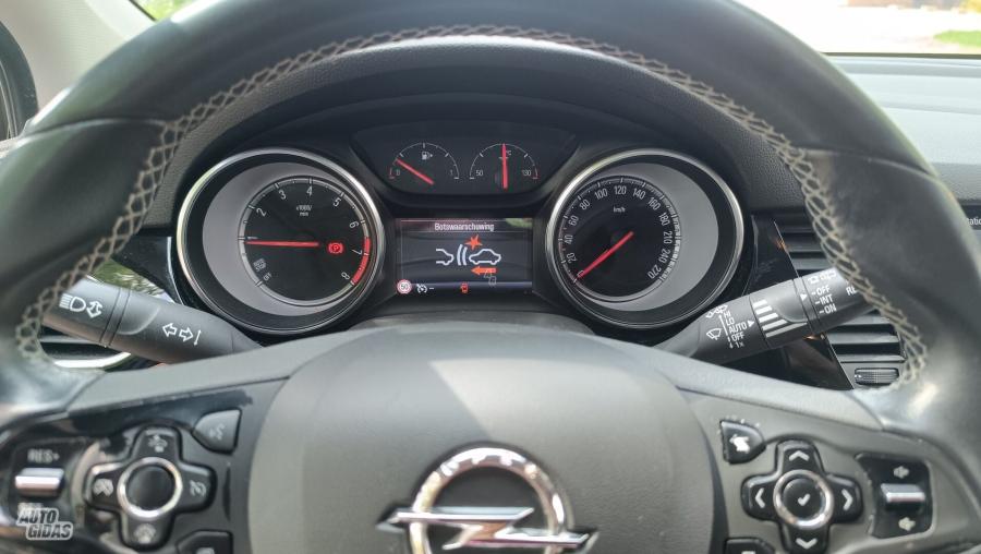 Black Opel Astra 2016 in Alytus, with an engine capacity of 1.00 L and mileage of 261 thousand km for 4999 €, photo 12 on AUTOMOTO.COM.LV