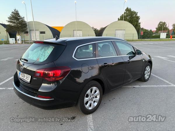 Black Opel Astra 2016 in Tartu, with an engine capacity of 1.60 L and mileage of 265 thousand km for 4490 €, photo 4 on AUTOMOTO.COM.LV