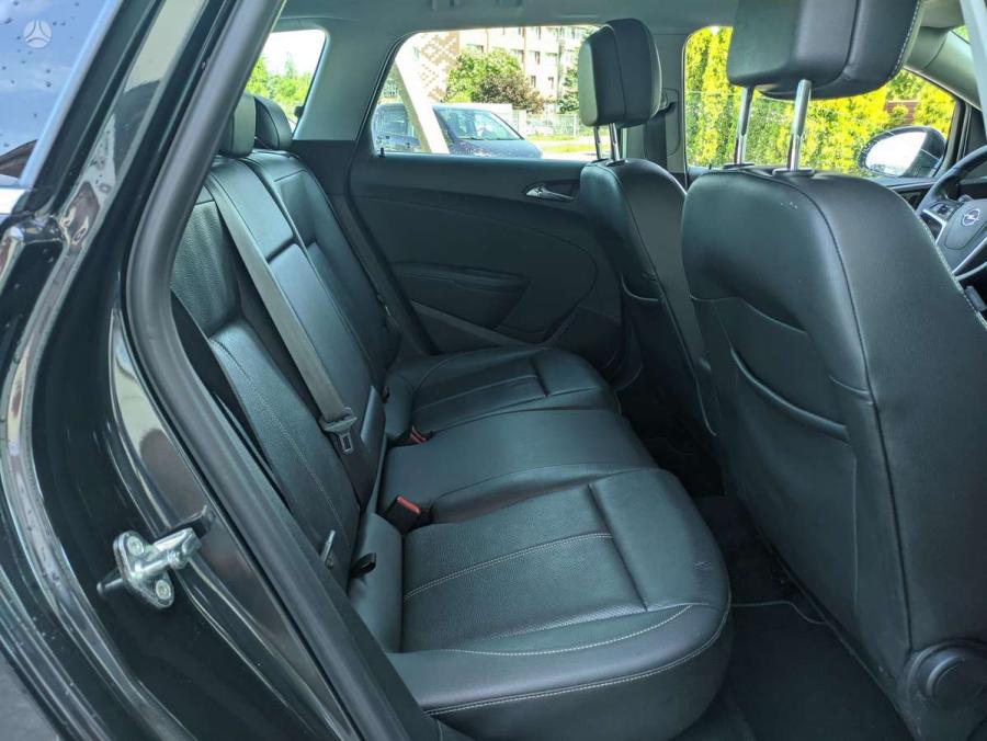 Black Opel Astra 2016 in Kretinga, with an engine capacity of 1.60 L and mileage of 260 thousand km for 5450 €, photo 15 on AUTOMOTO.COM.LV