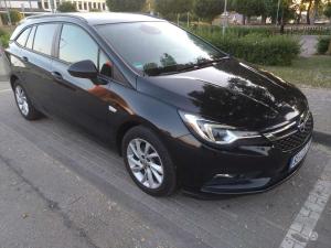 Black Opel Astra 2016 in Siauliai, with an engine capacity of 1.60 L and mileage of 212 thousand km for 5750 €, photo 3 on AUTOMOTO.COM.LV