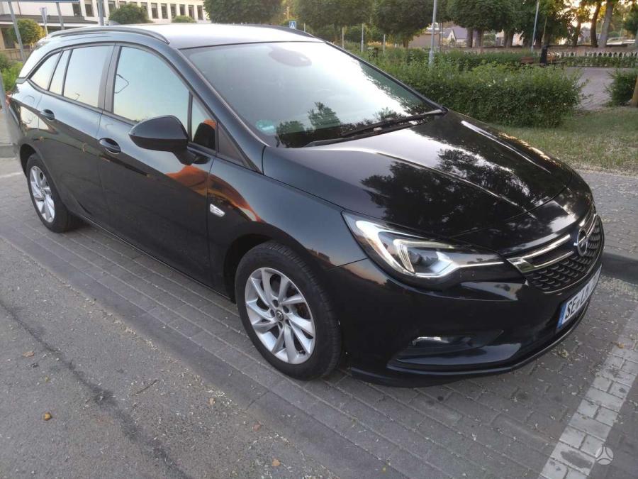 Black Opel Astra 2016 in Siauliai, with an engine capacity of 1.60 L and mileage of 212 thousand km for 5750 €, photo 3 on AUTOMOTO.COM.LV